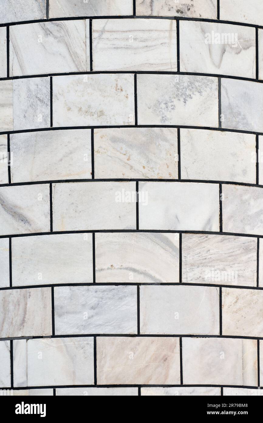 White marble bricks of Taj Mahal minaret towers, close up ivory white ...