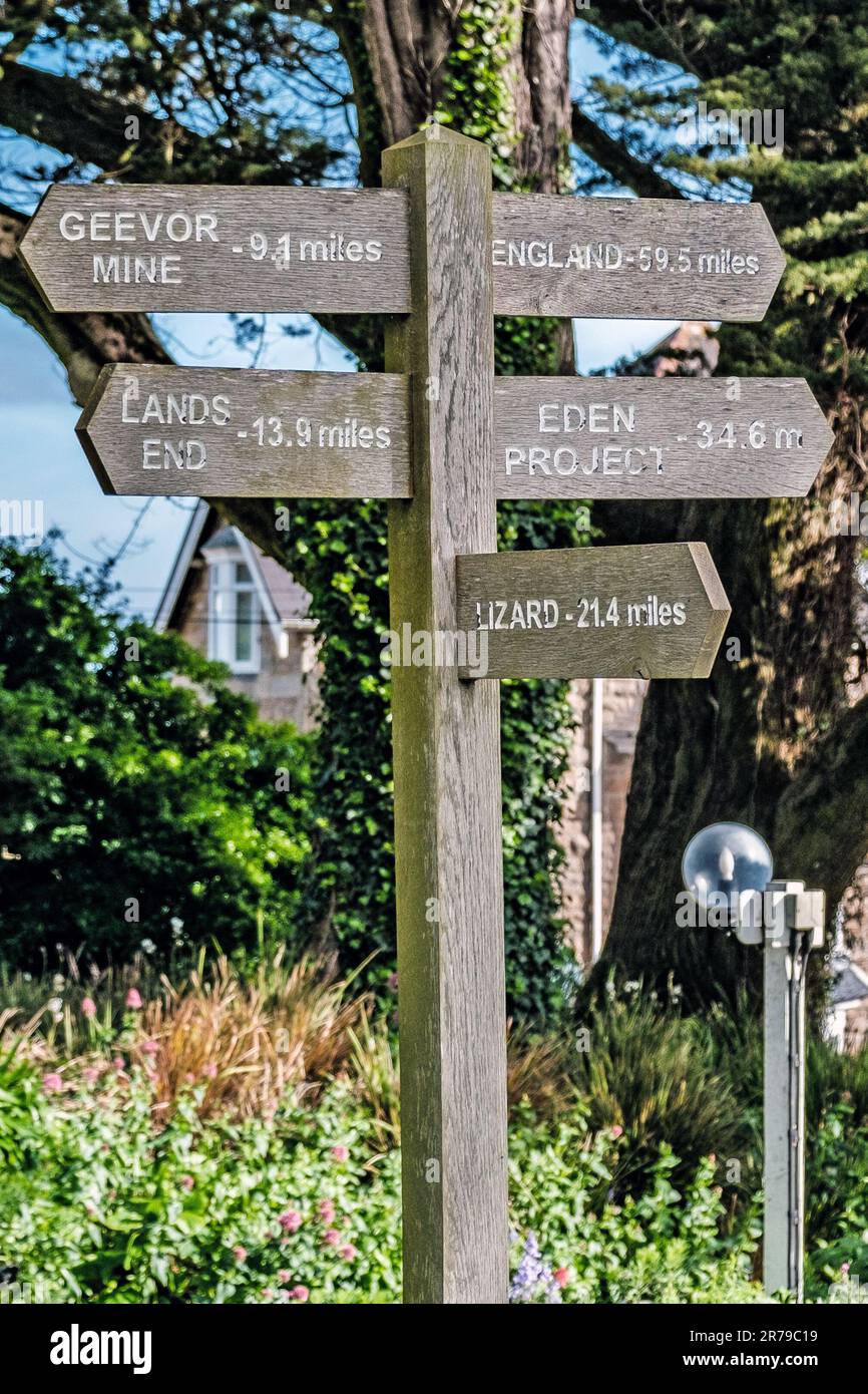 Sign in St Ives Cornwall indicating distances to Geevor Mine, Lands End ...