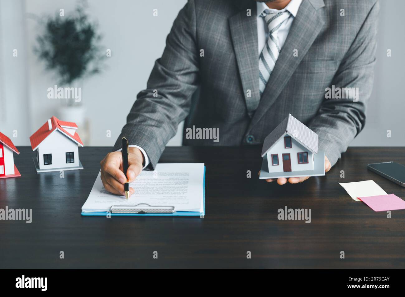 Property insurance and security concept. Protecting gesture of man and ...