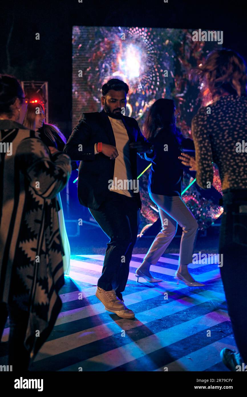 New Delhi, India - 10.12.2022 - Multinational night party funny people ...