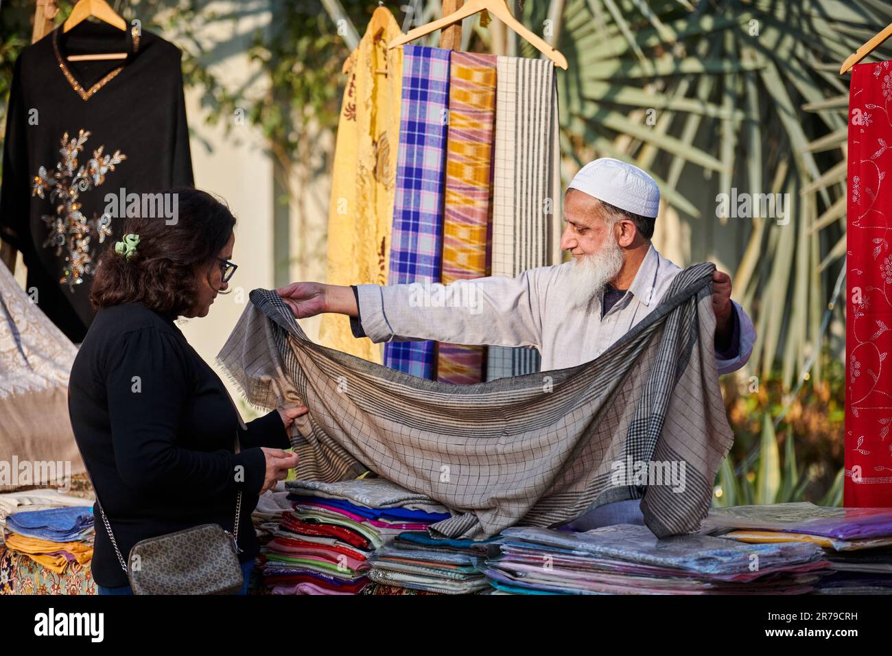 New Delhi, India - 10.12.2022 - Old seller of textile and carpet shows ...