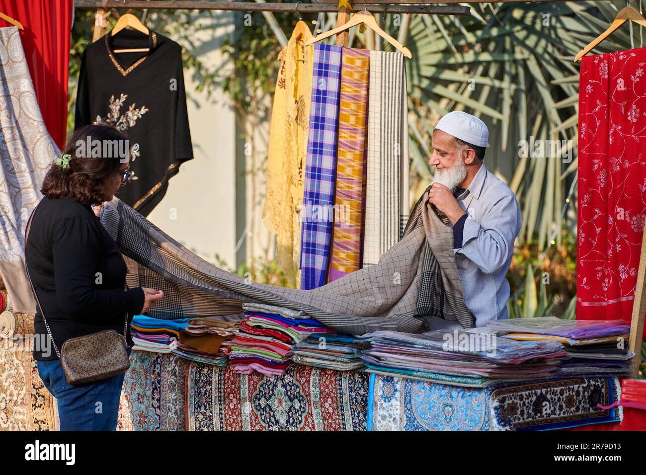 New Delhi, India - 10.12.2022 - Old seller of textile and carpet shows ...
