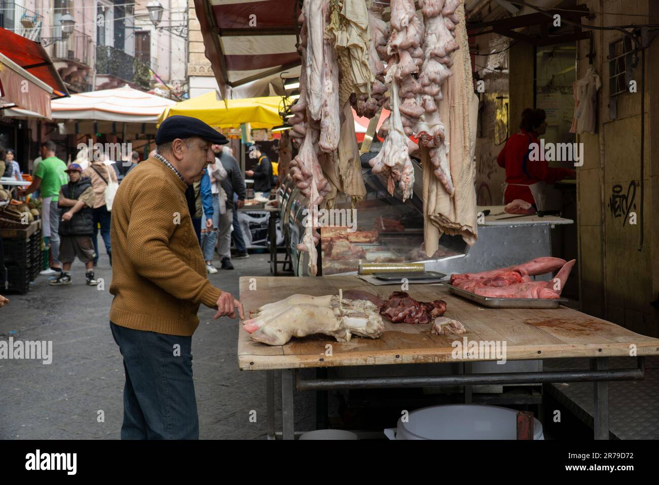 Men at work shop keepers stall owners in open air fresh fish meat ...