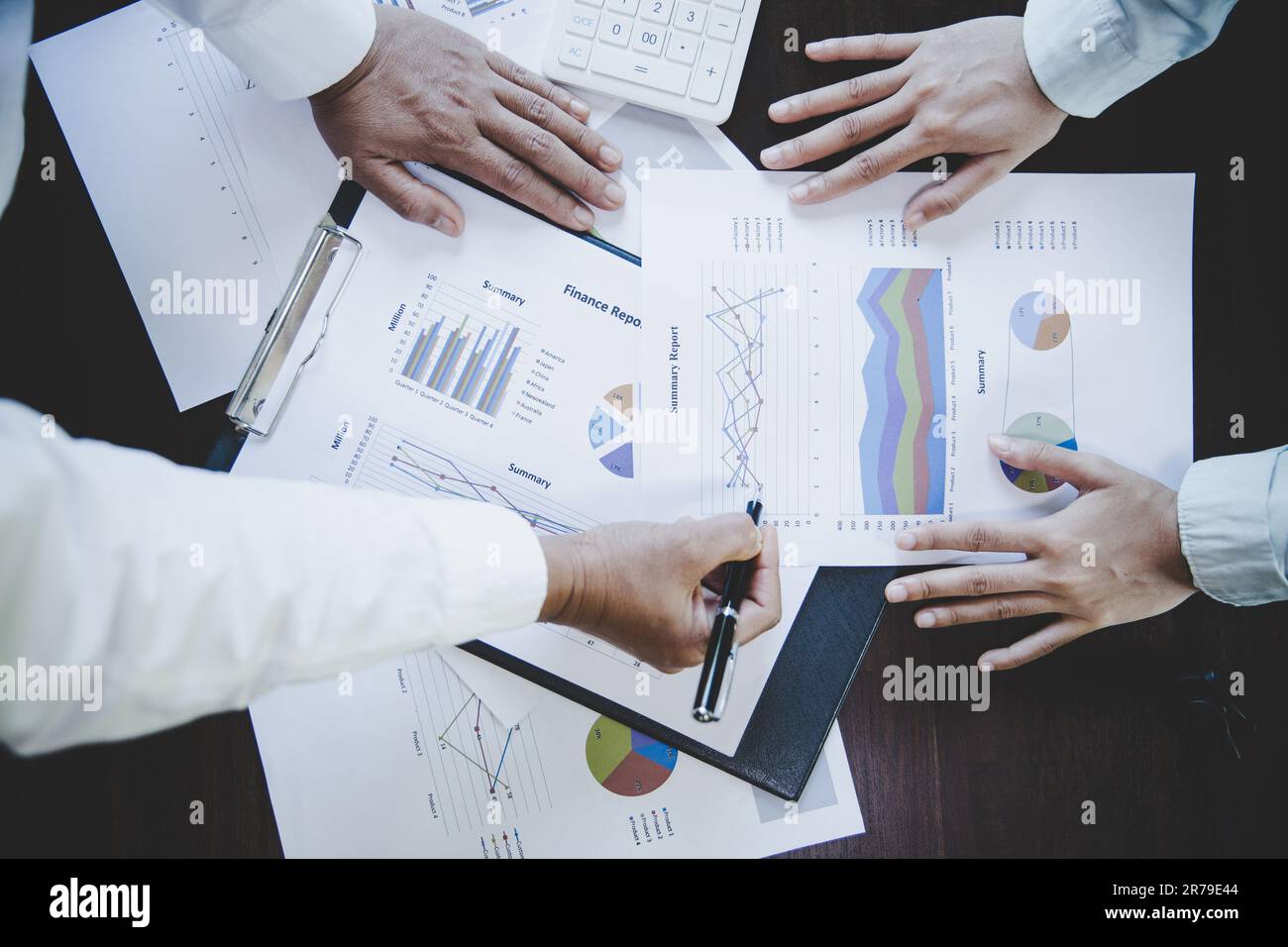Businessmen working on graphs hi-res stock photography and images - Alamy