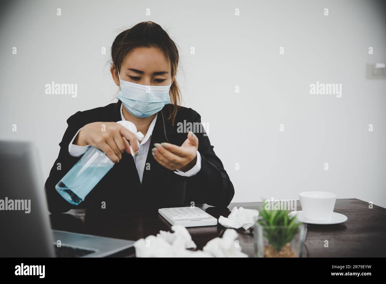 Sick young asian business woman wearing protective face mask having ... Sick young asian business woman wearing protective face mask having ...