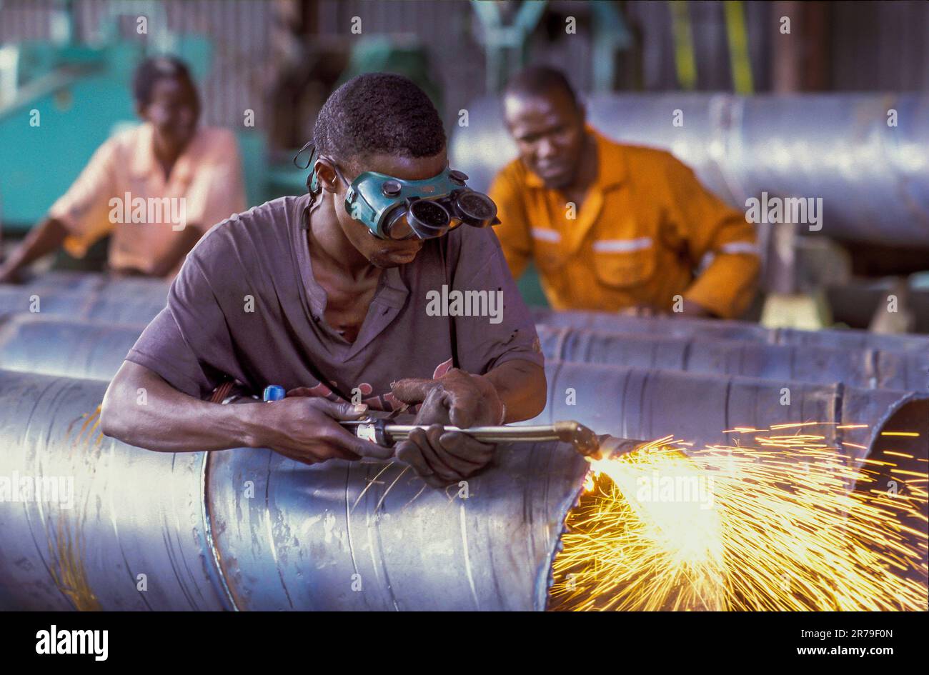 Zambia, Ndola factoryworker is welding pipes in the Hudson ...