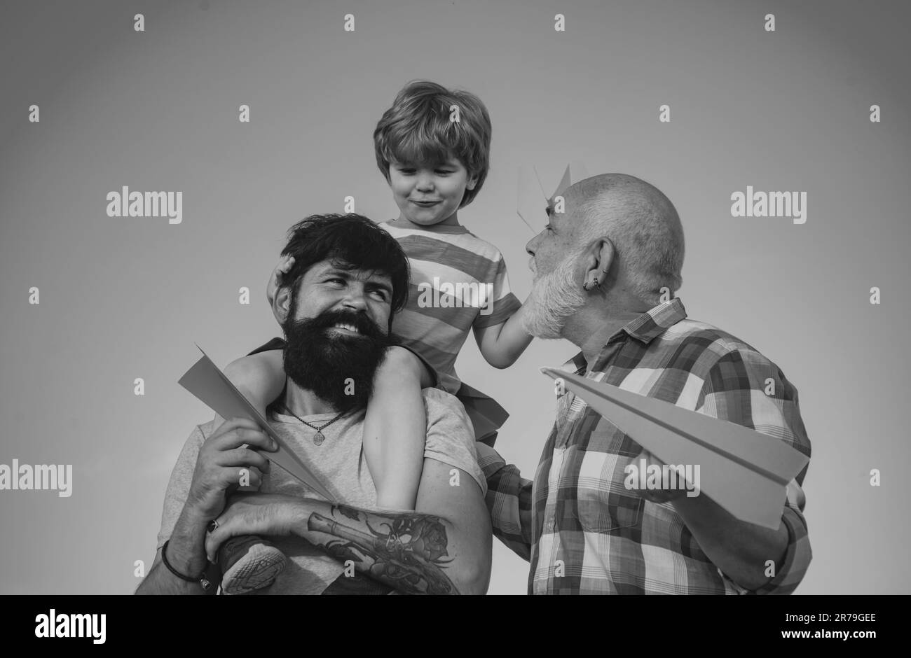 Three men generation. Generation concept. Airplane ready to fly. Three ...