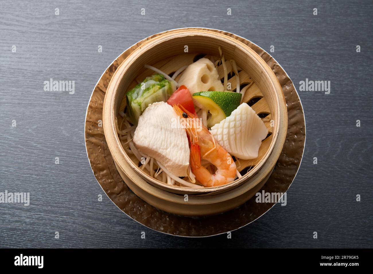 Japanese cuisine, steamed chicken and shrimp, squid and vegetables ...