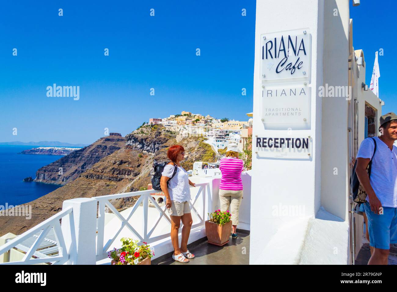 Luxury hotels and restaurants perched on the cliff edge of the Caldera ...