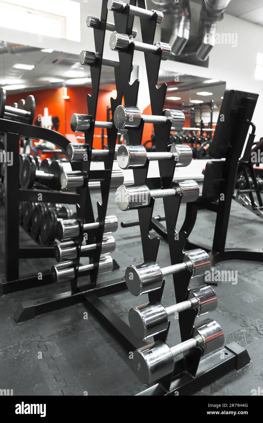 Dumbbells in the gym Stock Photo - Alamy