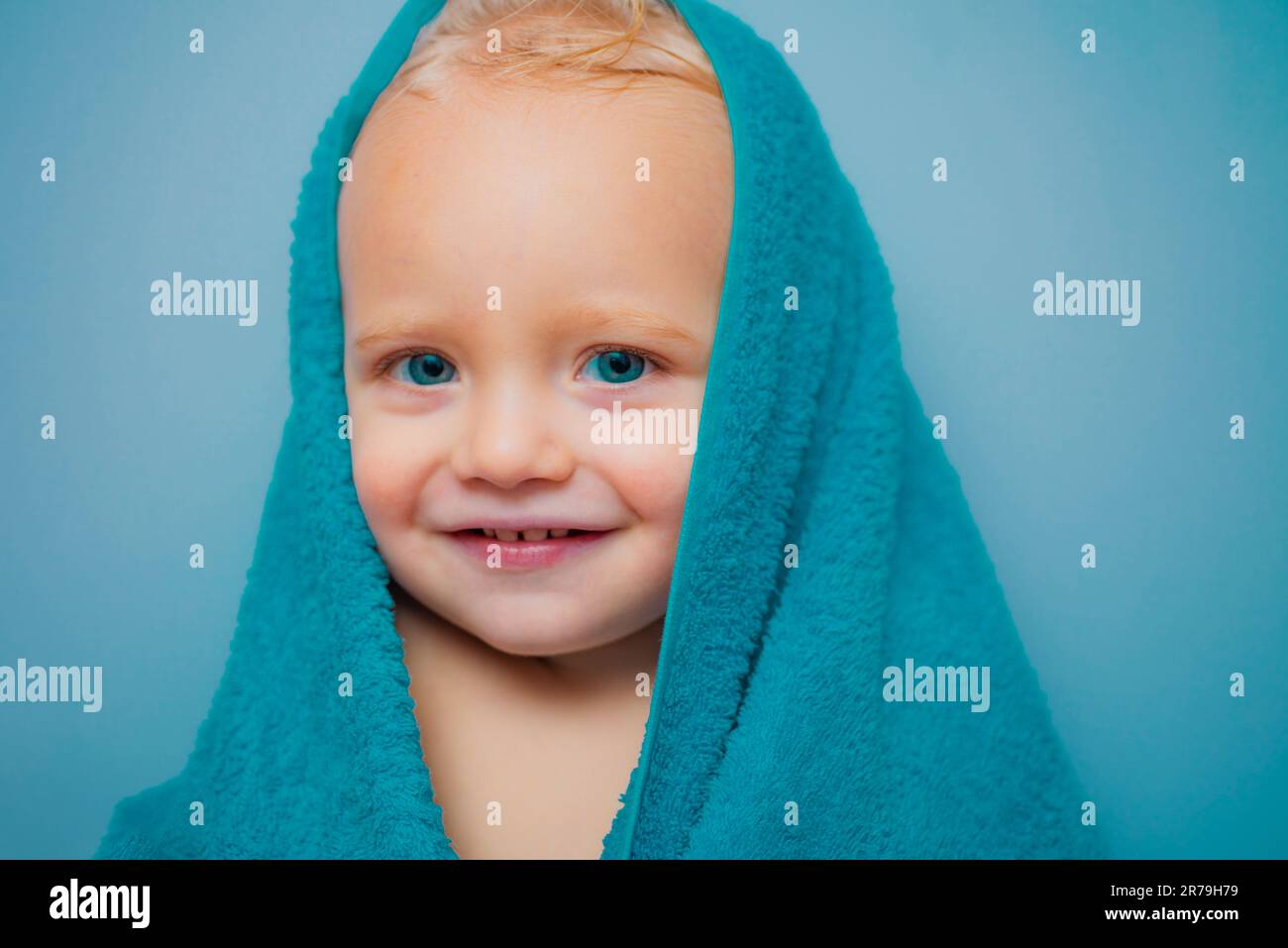 Purity and hygiene education. Child in clean and dry towel. Happy bath ...