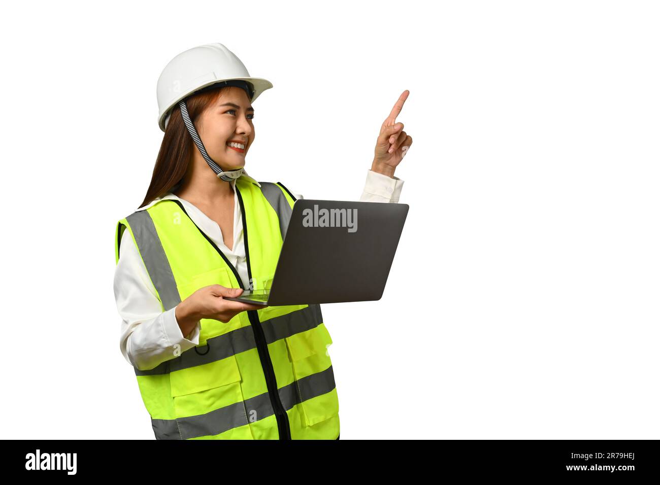 Portrait Asian woman engineer in safety helmet holding laptop and ...