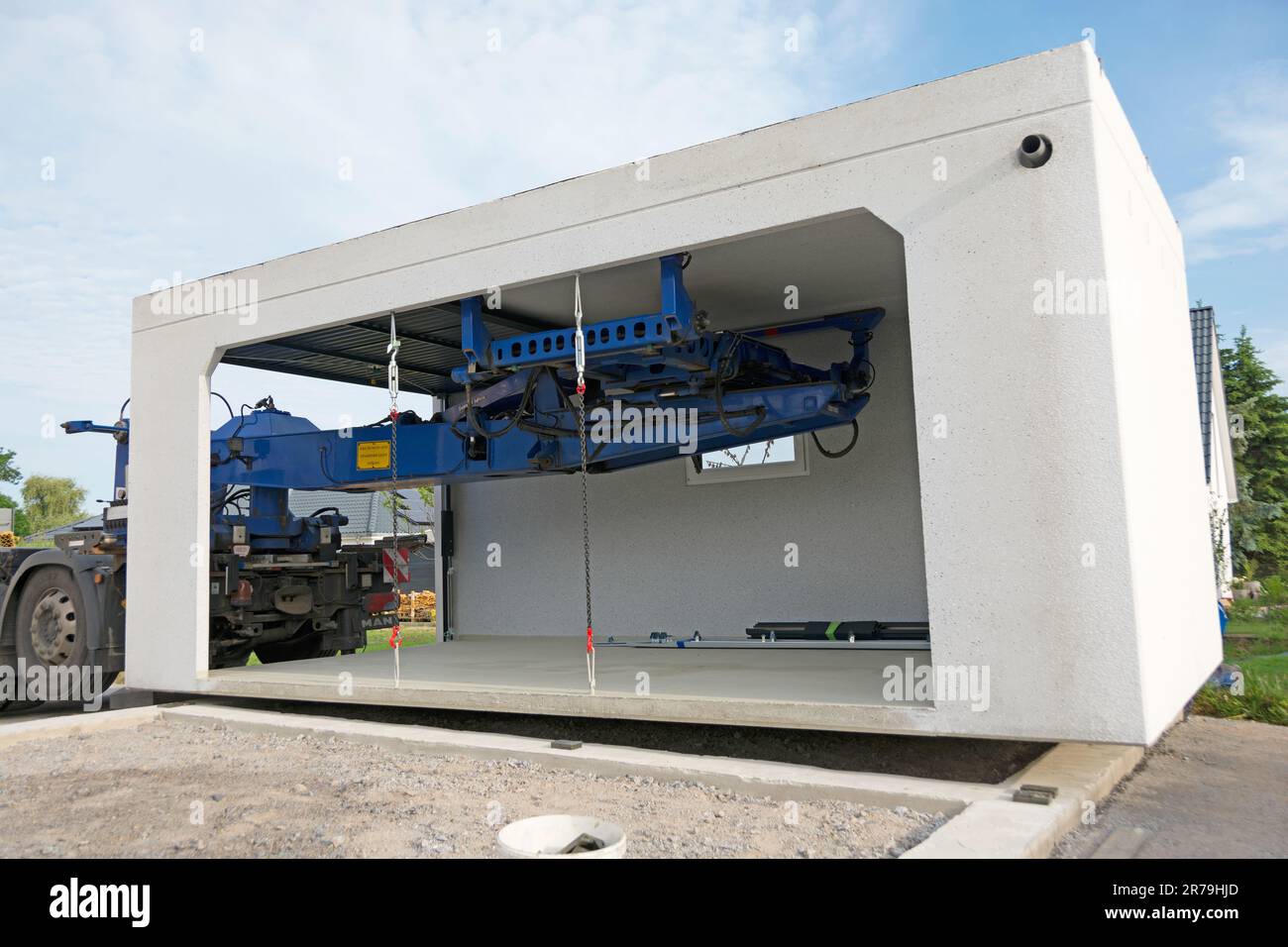 Half of a concrete double prefabricated garage Stock Photo - Alamy