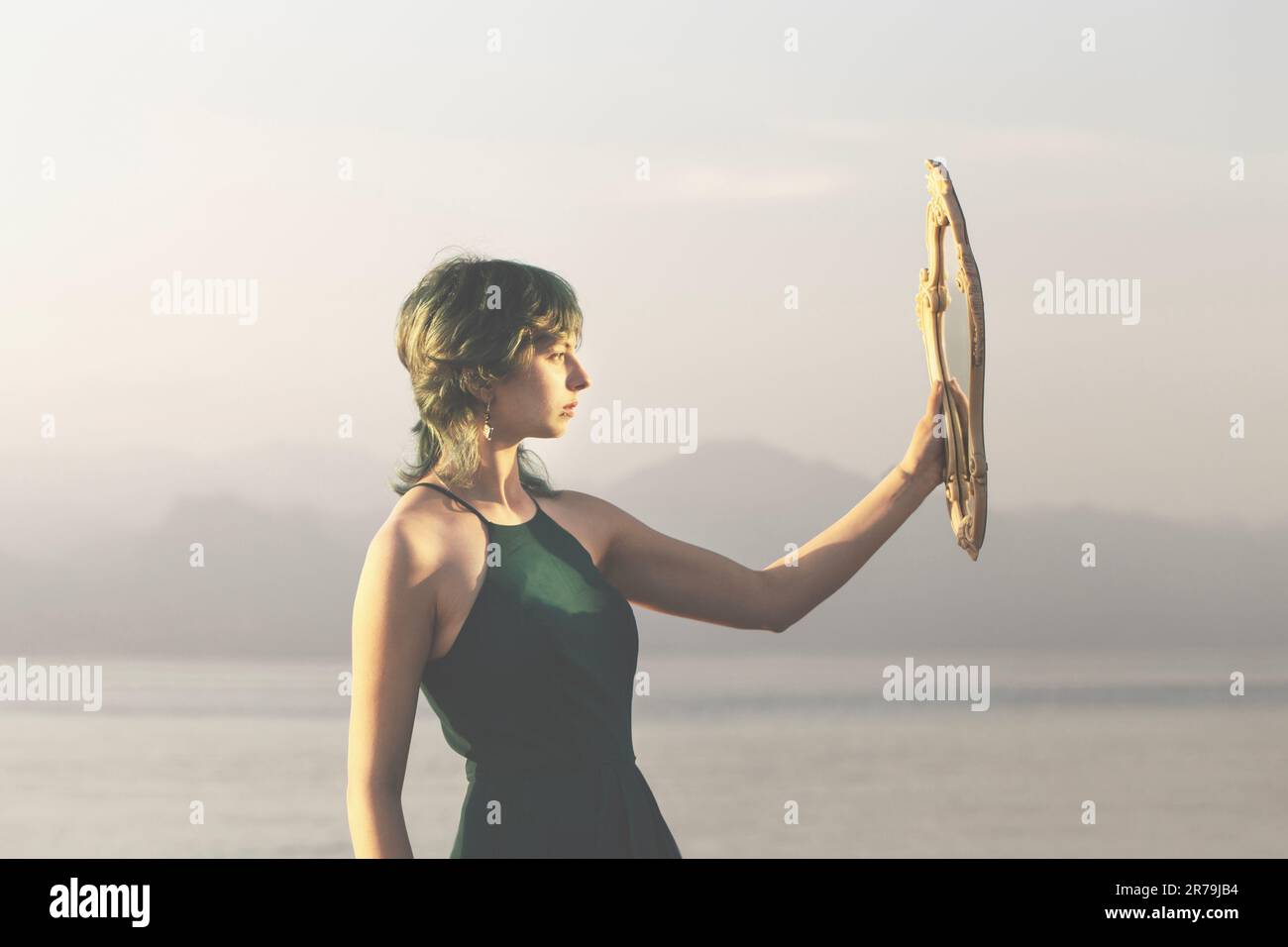vain woman mirrors herself illuminated by sunlight Stock Photo - Alamy