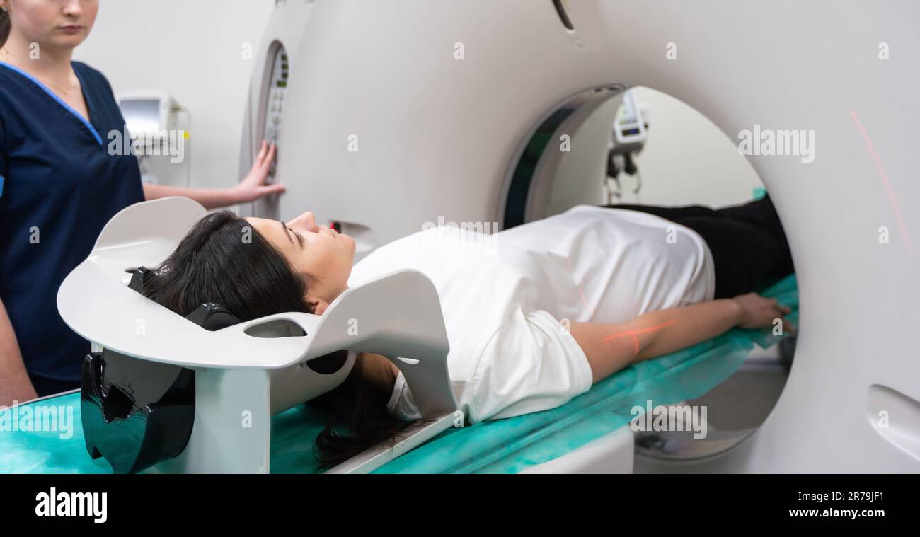 Doctor doing computed tomography for female patient stock photo ...