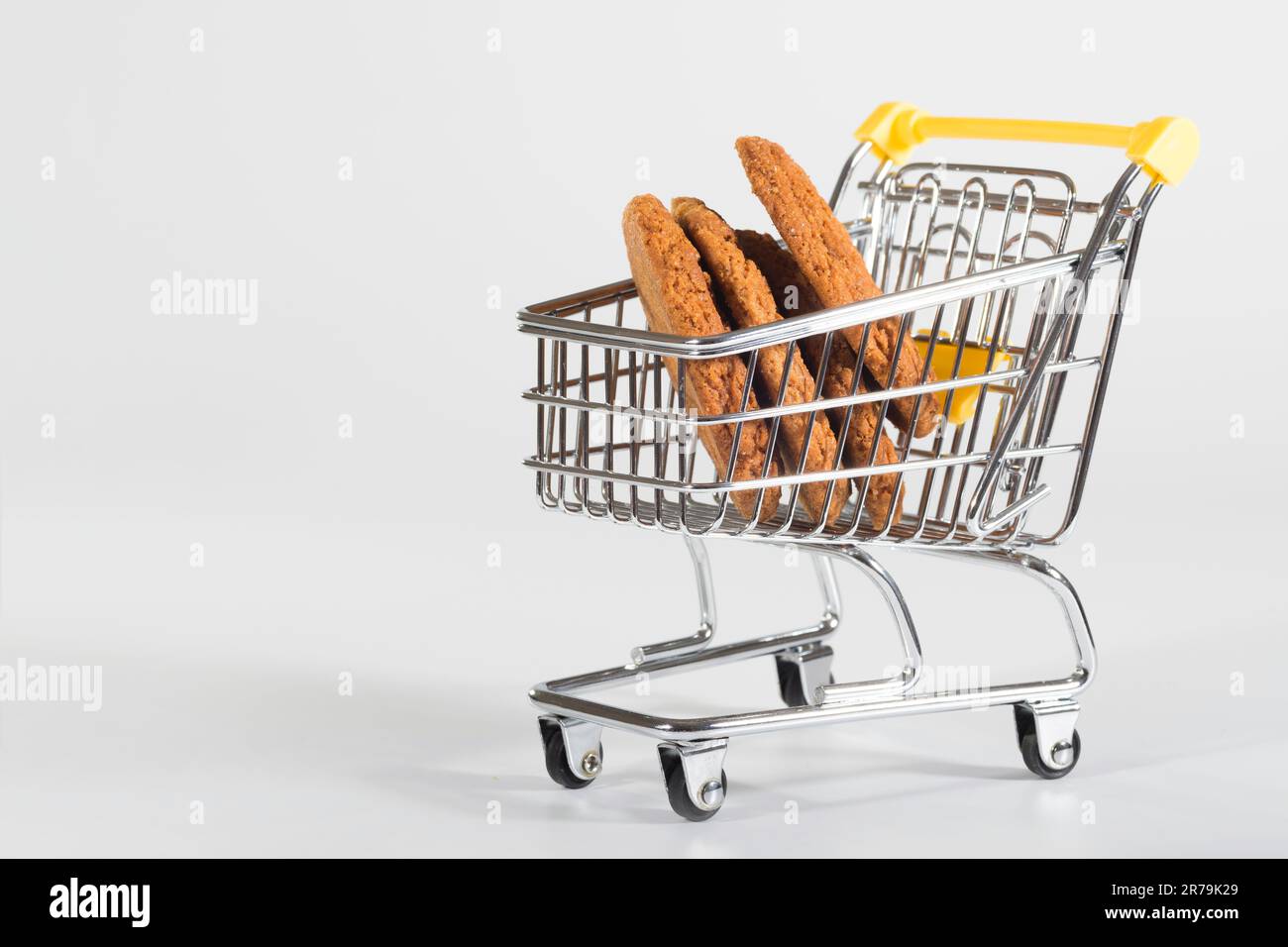 Homemade cookies in a cart, a close-up at the white background Stock ...