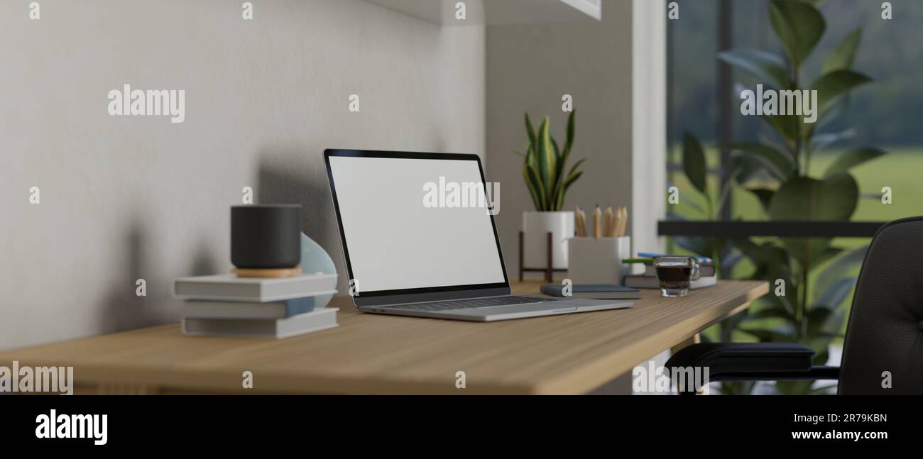 Close-up rear view of a laptop white screen mockup and accessories on a ...