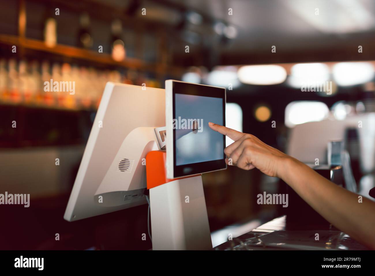 Woman hand doing process payment on a touchscreen cash register Stock ...