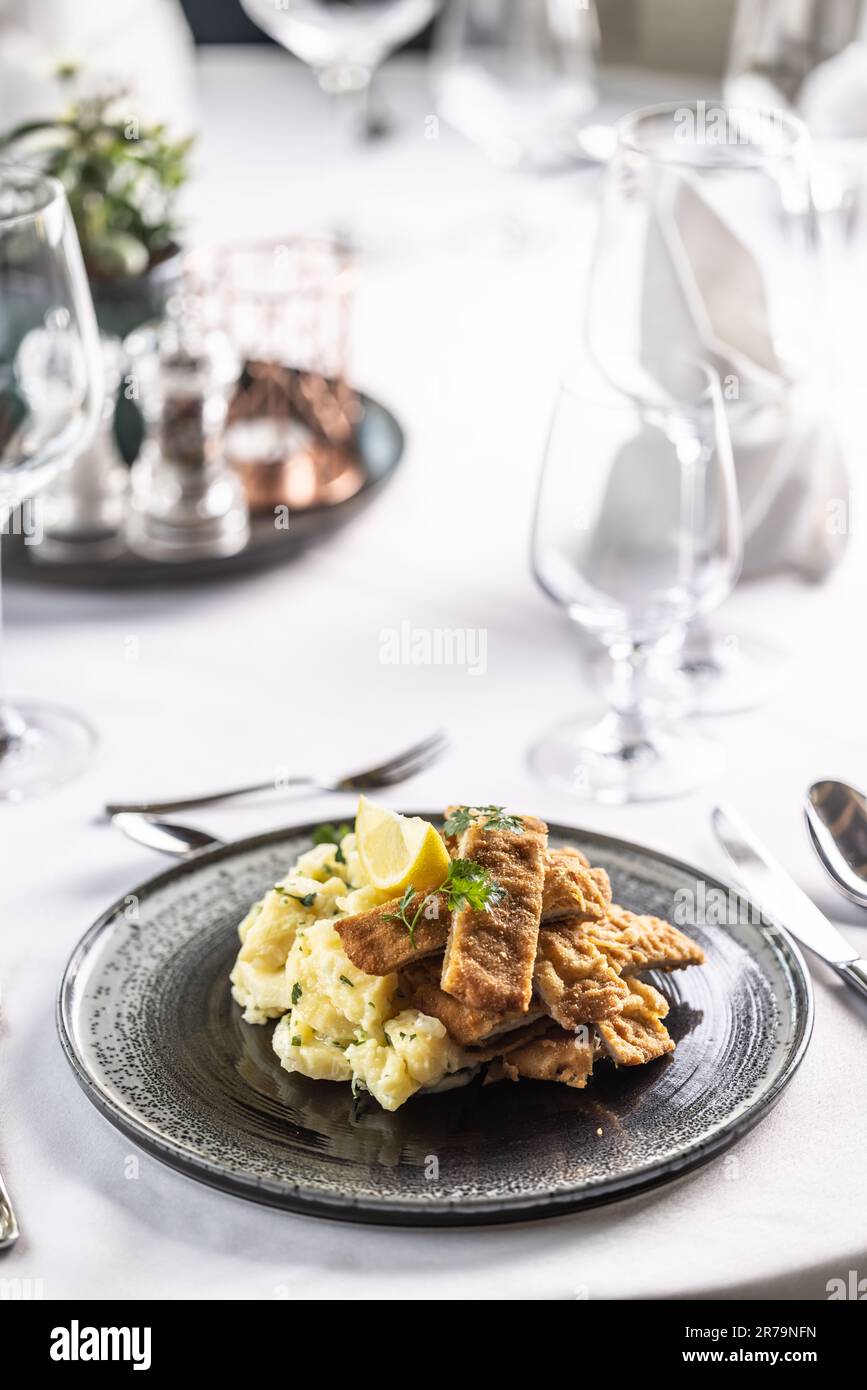 Orecchio d'elefante, Italian schnitzel, served cut in strips with ...