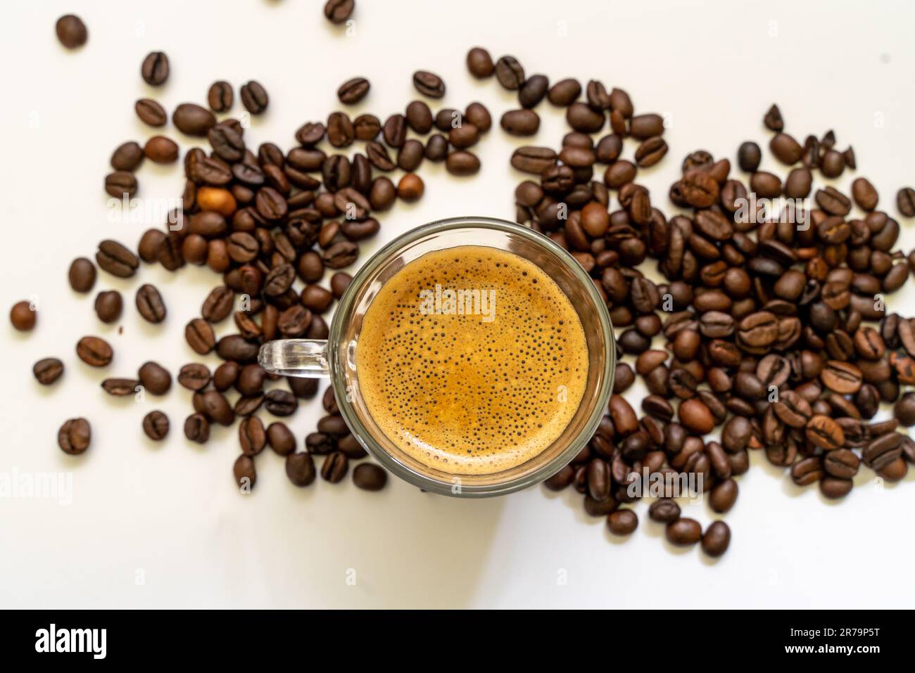 Cup of coffee surrounded by coffee beans hi-res stock photography and ...