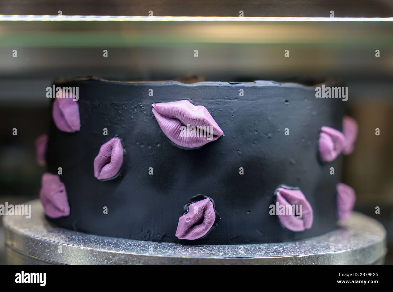 Chocolate cake decorated with sweet pink lips Stock Photo - Alamy