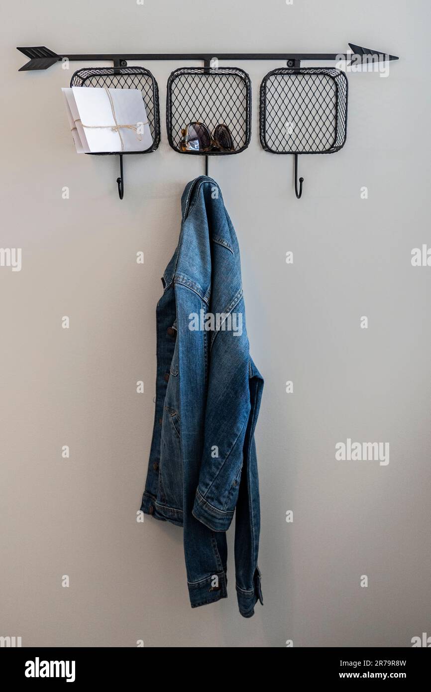 An interior design of clothes hanging on a hanger Stock Photo - Alamy
