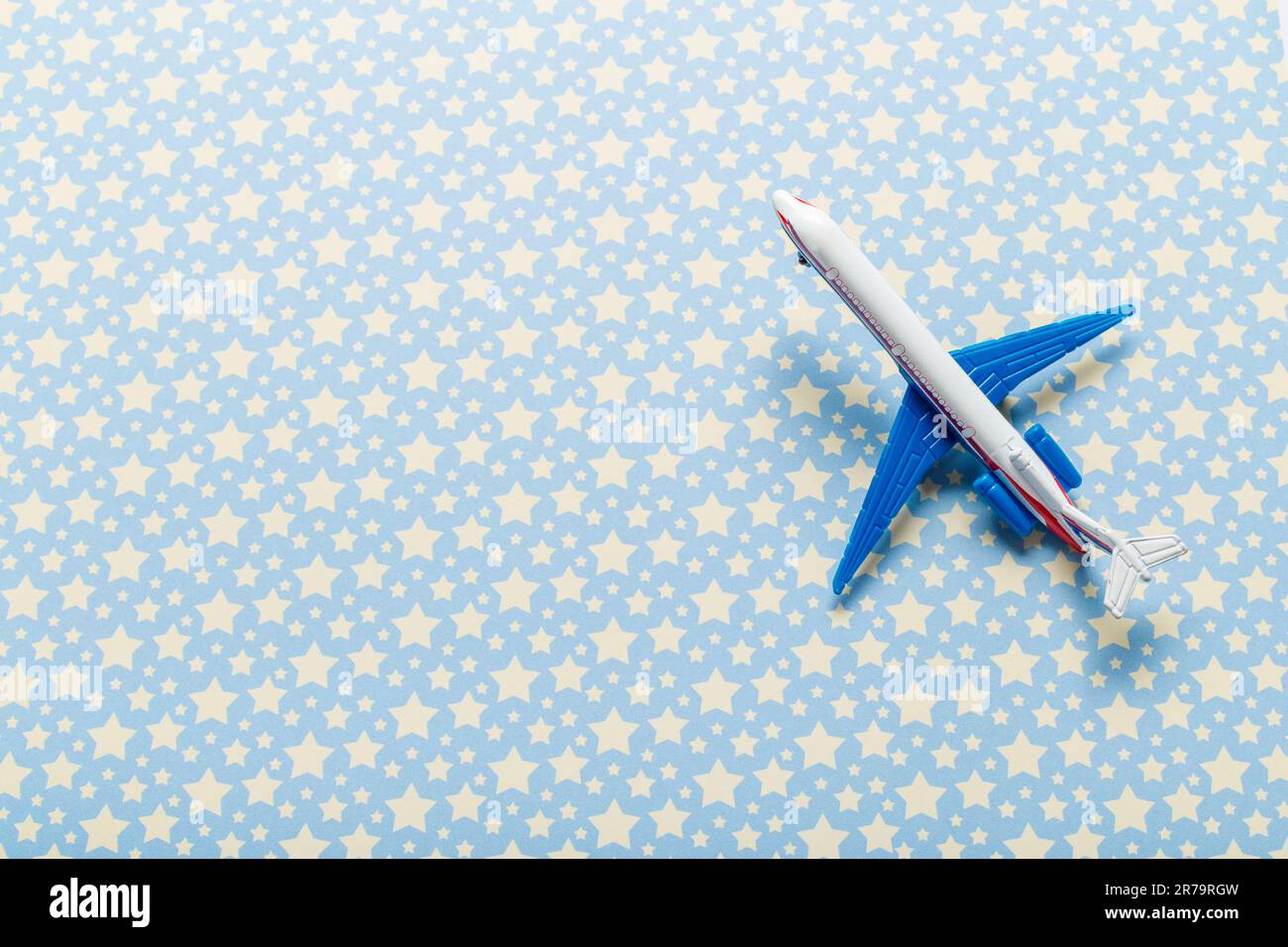 Miniature airplane travel theme Stock Photo - Alamy