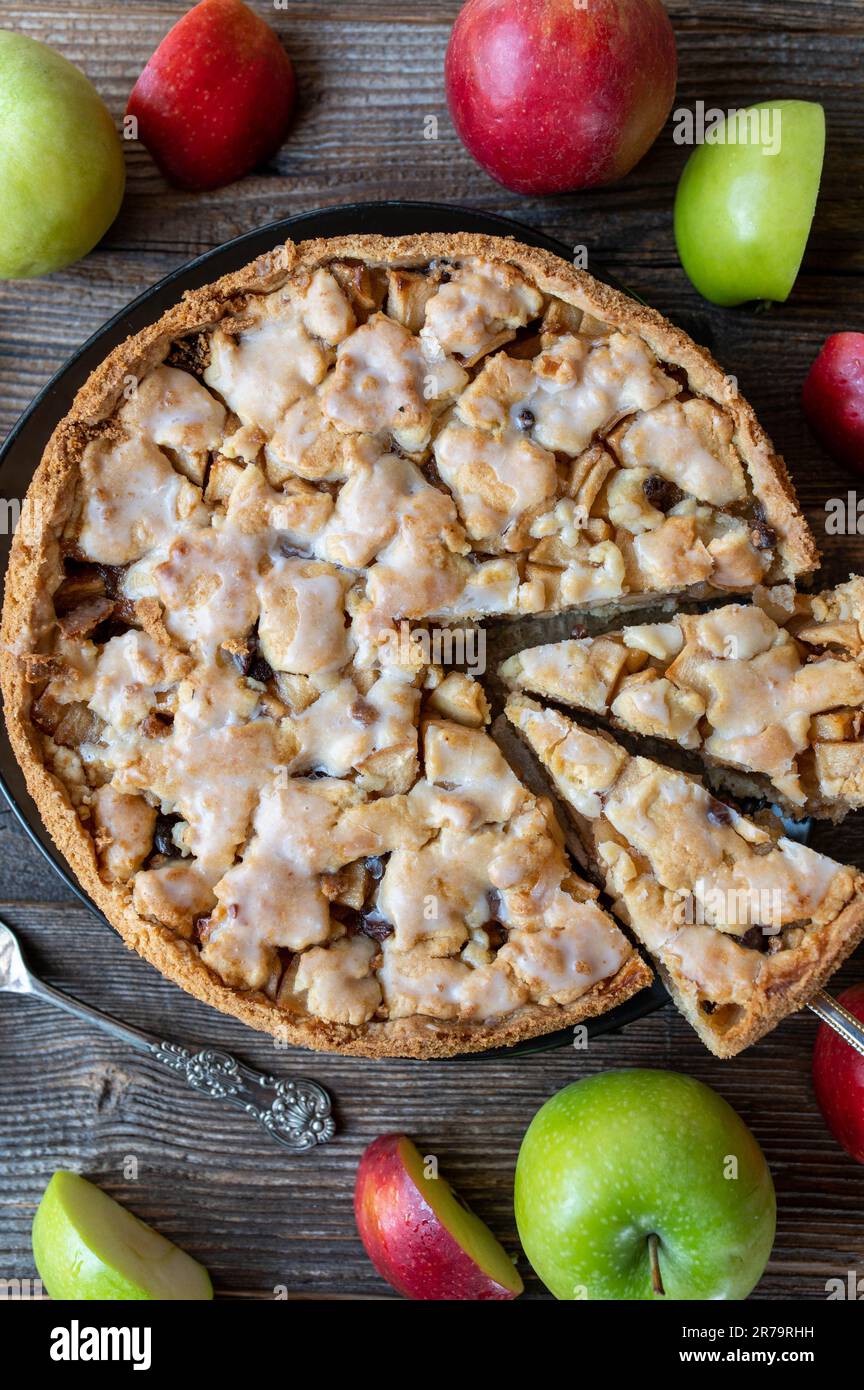 Whole and round apple pie baked with short crust pastry, precooked ...