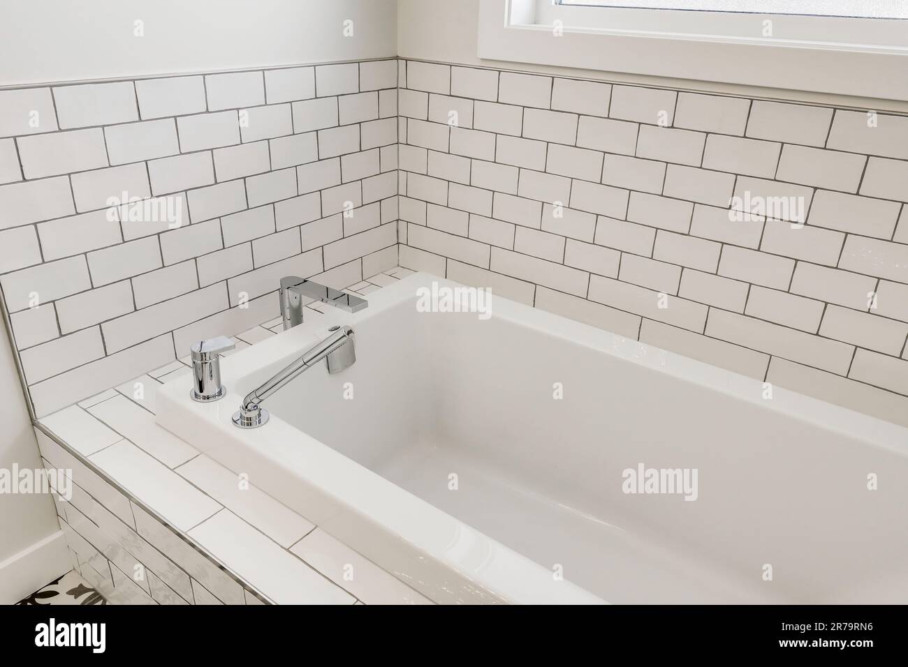 An interior design of a tap in a modern bathroom Stock Photo - Alamy