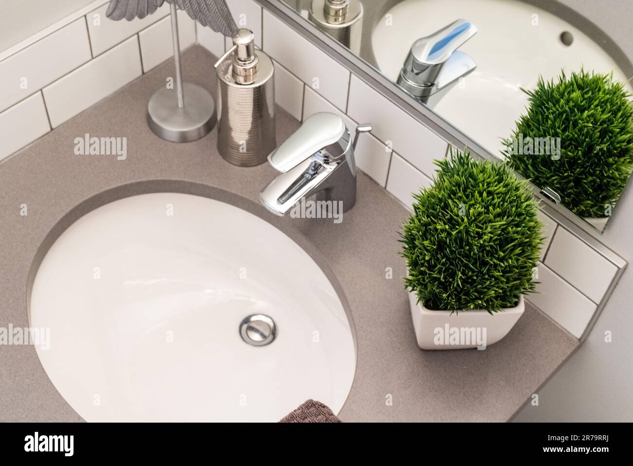 An interior design of a tap in a modern bathroom Stock Photo - Alamy