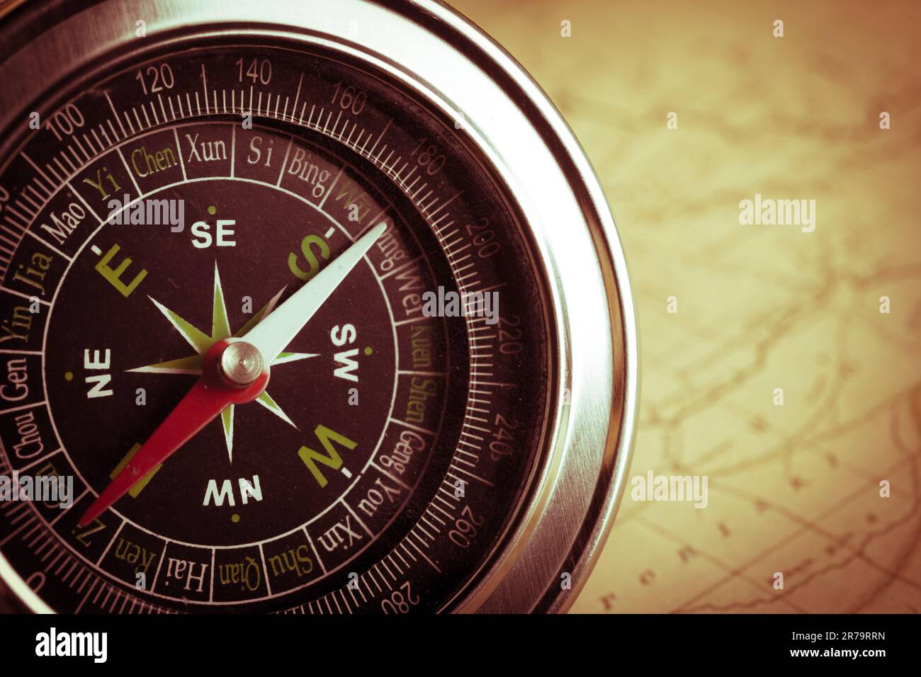 Old compass on vintage map Stock Photo - Alamy