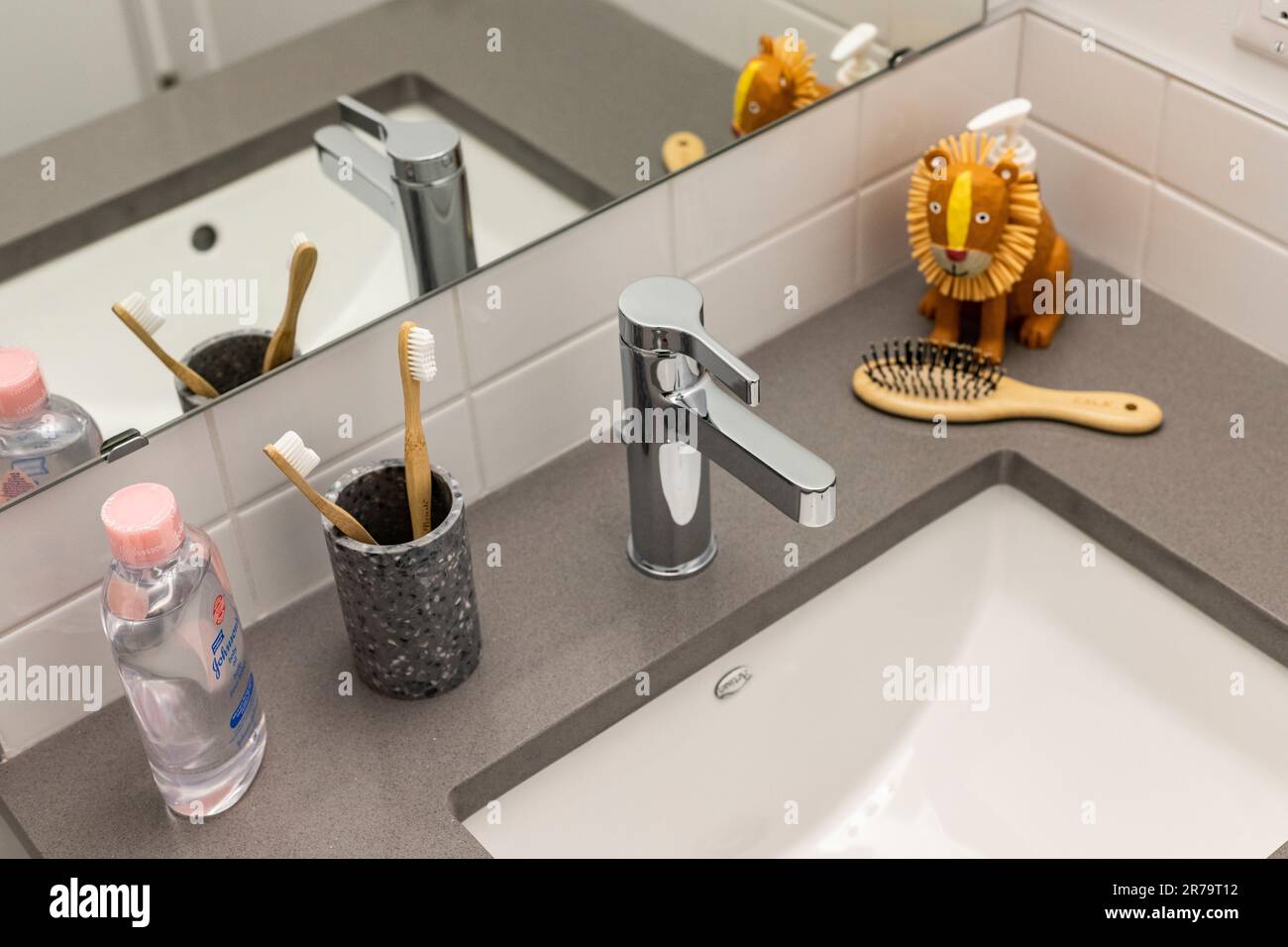 An interior design of a tap in a modern bathroom Stock Photo - Alamy