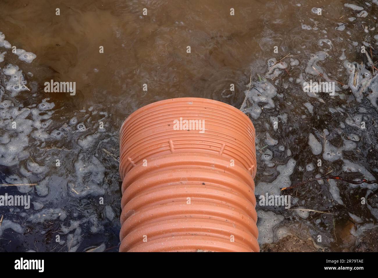 Drainage pipe with water stream flowing. Storm water management in ...