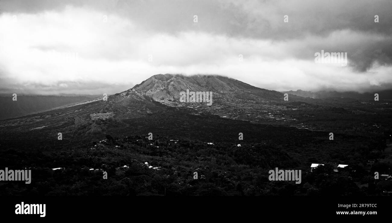 The second-largest volcano in Bali, Batung on a cloudy sky background ...
