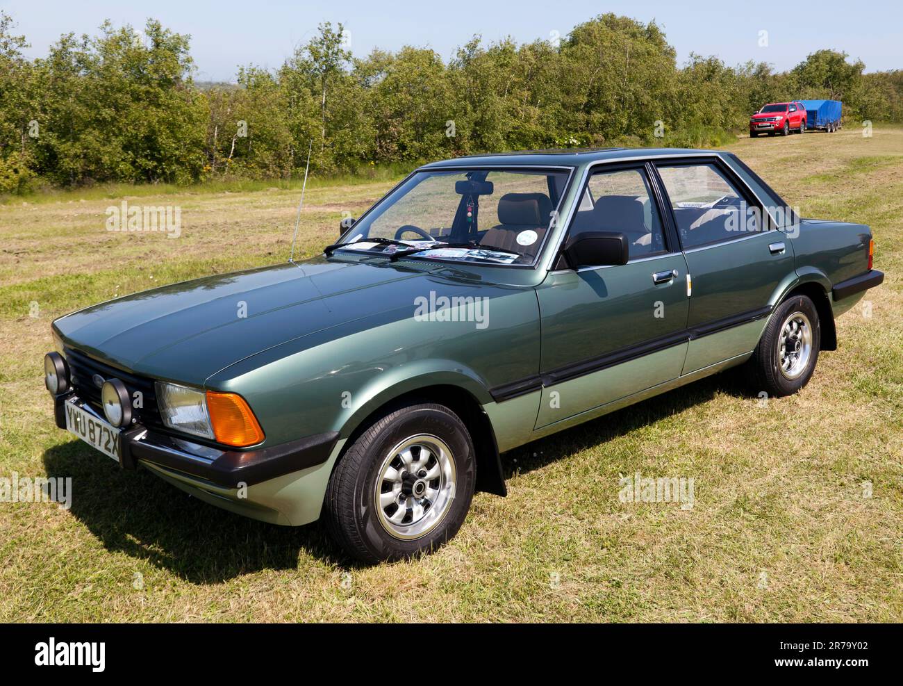 Three-quarter front view of a Green, 1981, Ford Granada Mk II, on ...