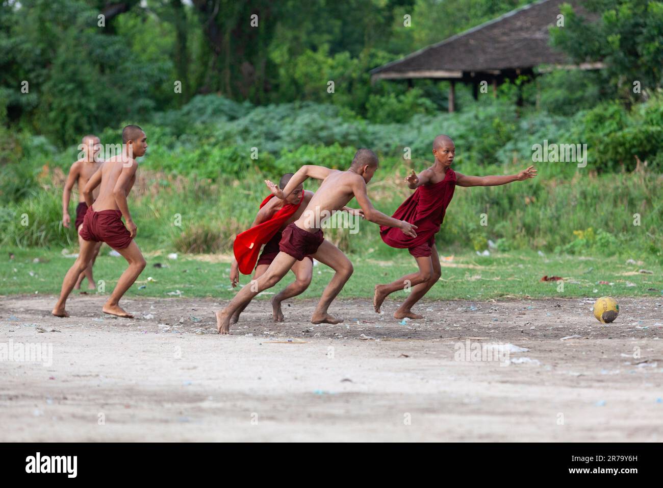 Burmese buddhist monks playing soccer hi-res stock photography and ...