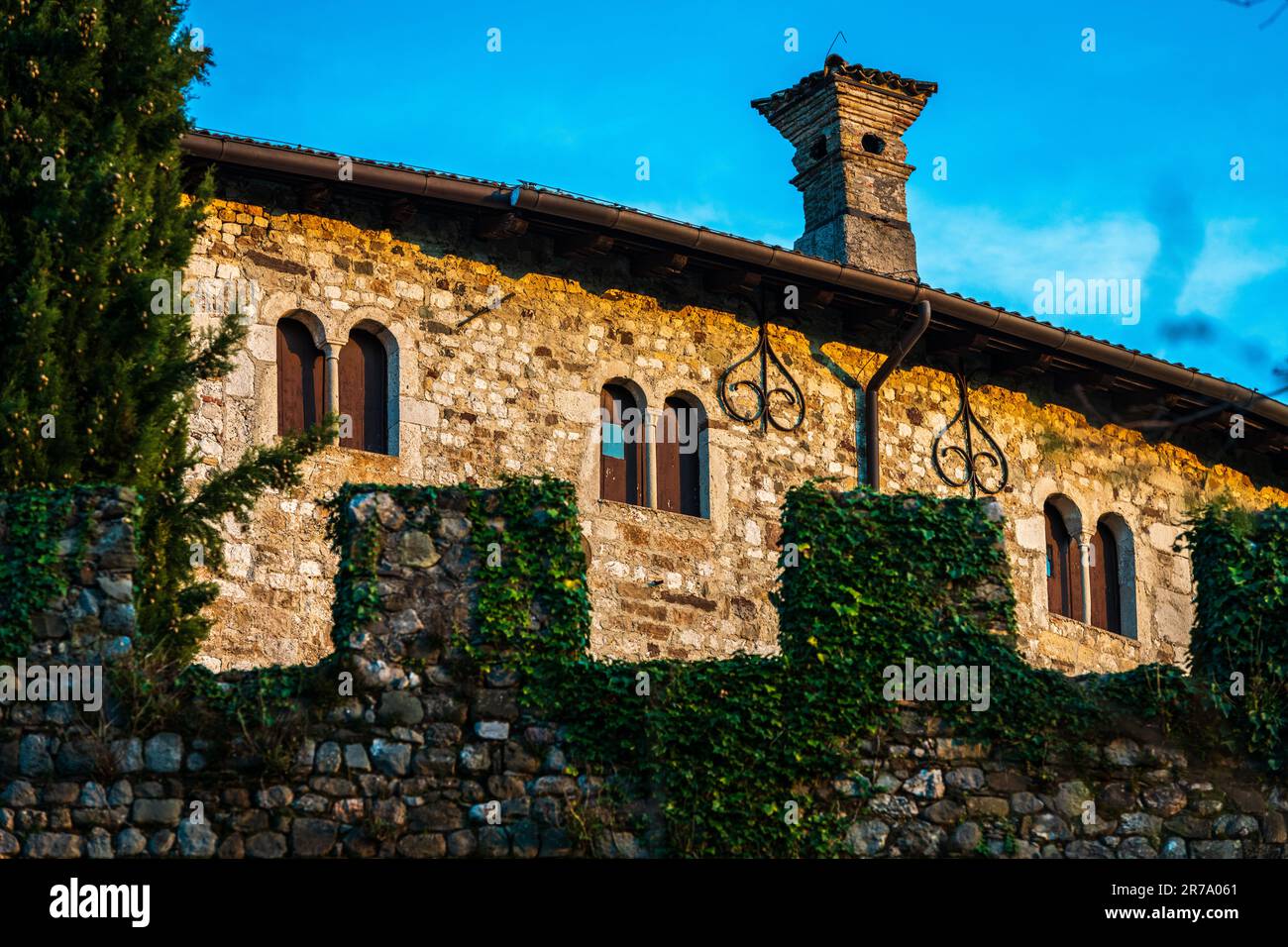 The ancient castle of Arcano in the Friuli hills. Fiery sunset Stock ...