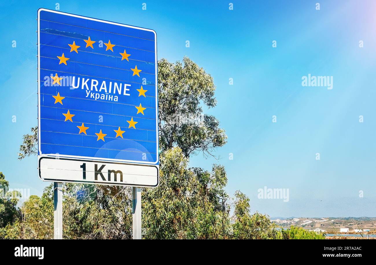 Road sign on the border of a European Union country, Austria 1km ahead ...