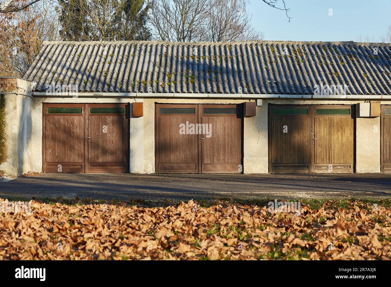 Garage row in a town Stock Photo - Alamy