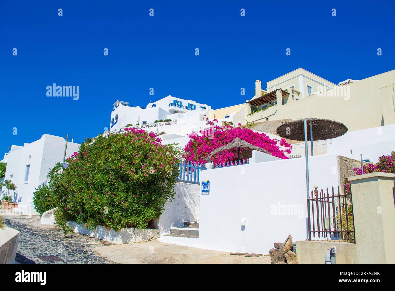 Picturesque architecture of Fira with 5-stars hotels and restaurant ...