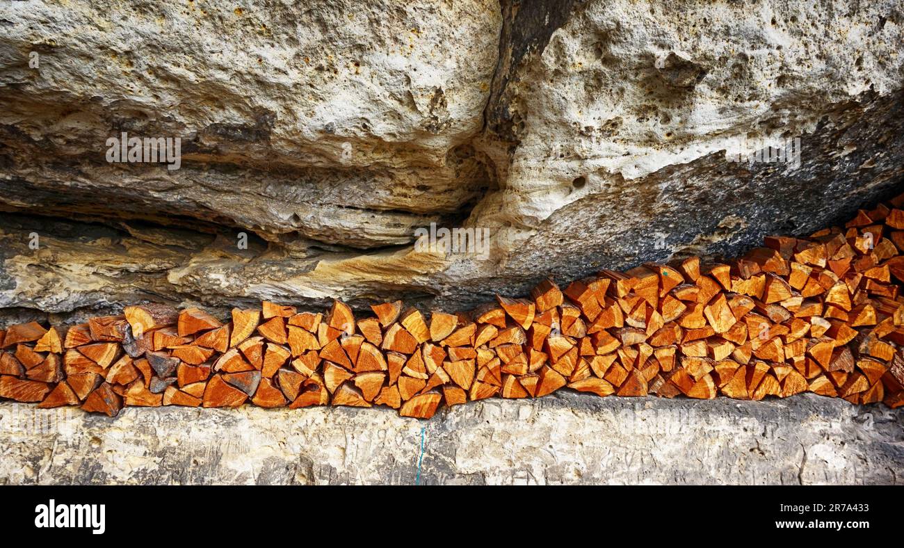 firewood background in the cave interior as texture Stock Photo - Alamy