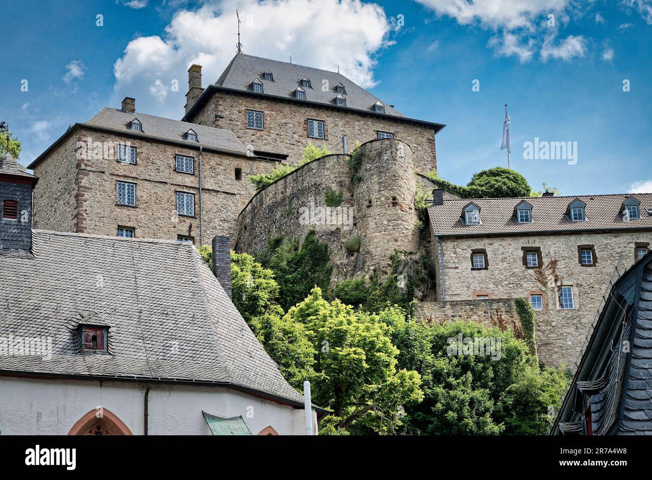 the historic castle blankenheim in the eifel hills in sunny weather ...