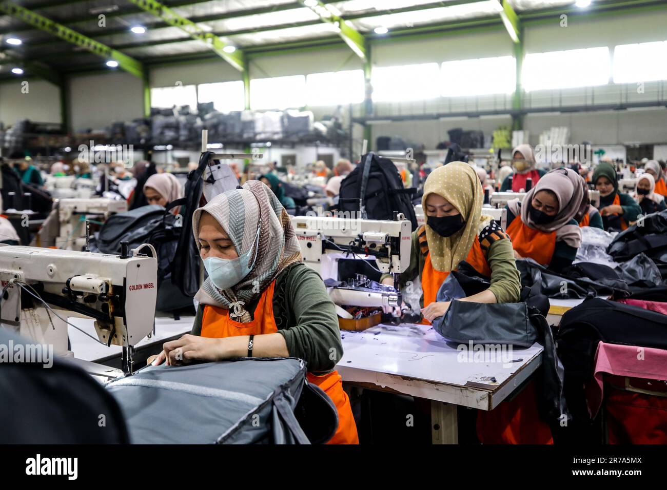 Bandung, West Java, Indonesia. 14th June, 2023. Workers complete the ...