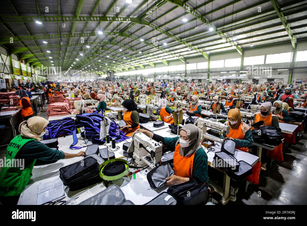 Bandung, West Java, Indonesia. 14th June, 2023. Workers complete the ...