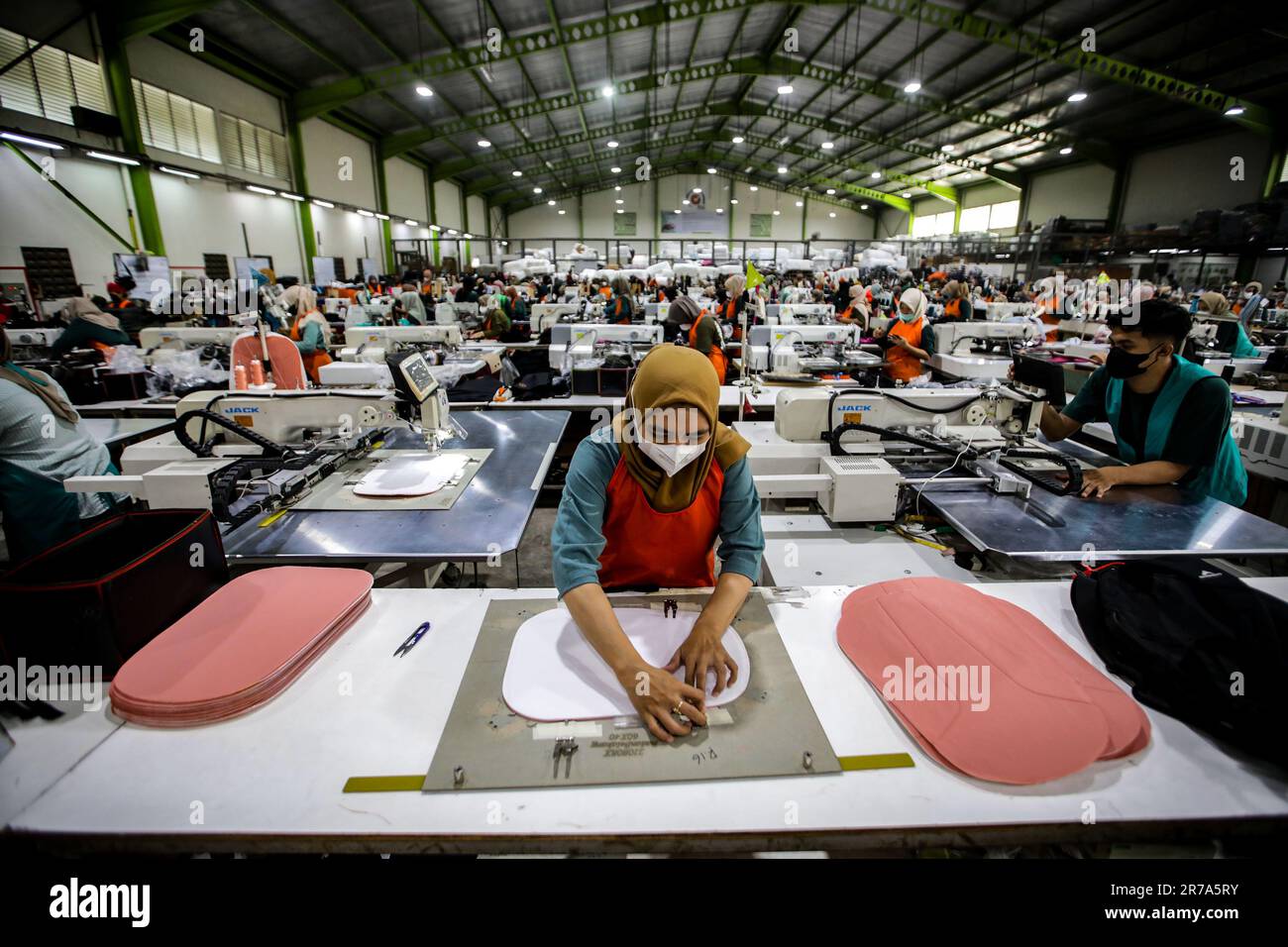 Bandung, West Java, Indonesia. 14th June, 2023. Workers complete the ...