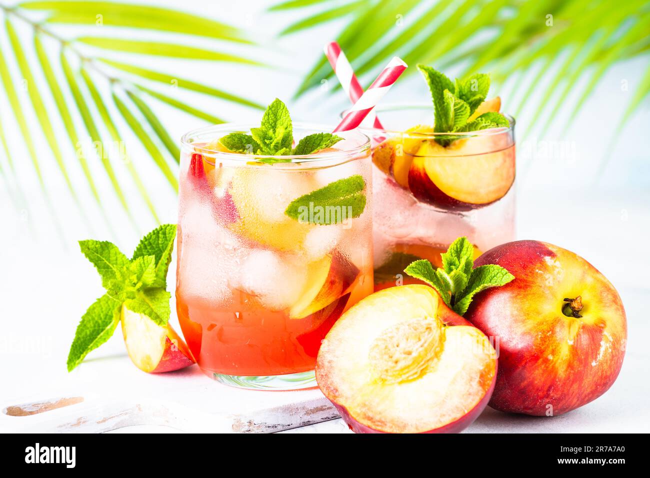 Peach cocktail, iced peach tea, fruit drink Stock Photo - Alamy