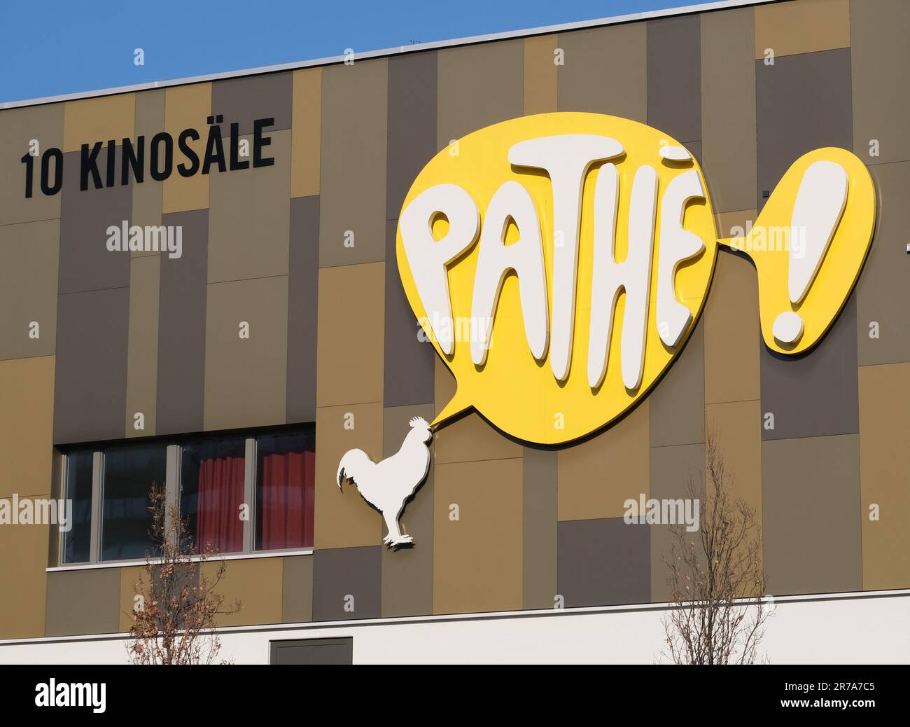 The PATHE logo on the side of a large commercial building in Spreitenbach, Switzerland ...