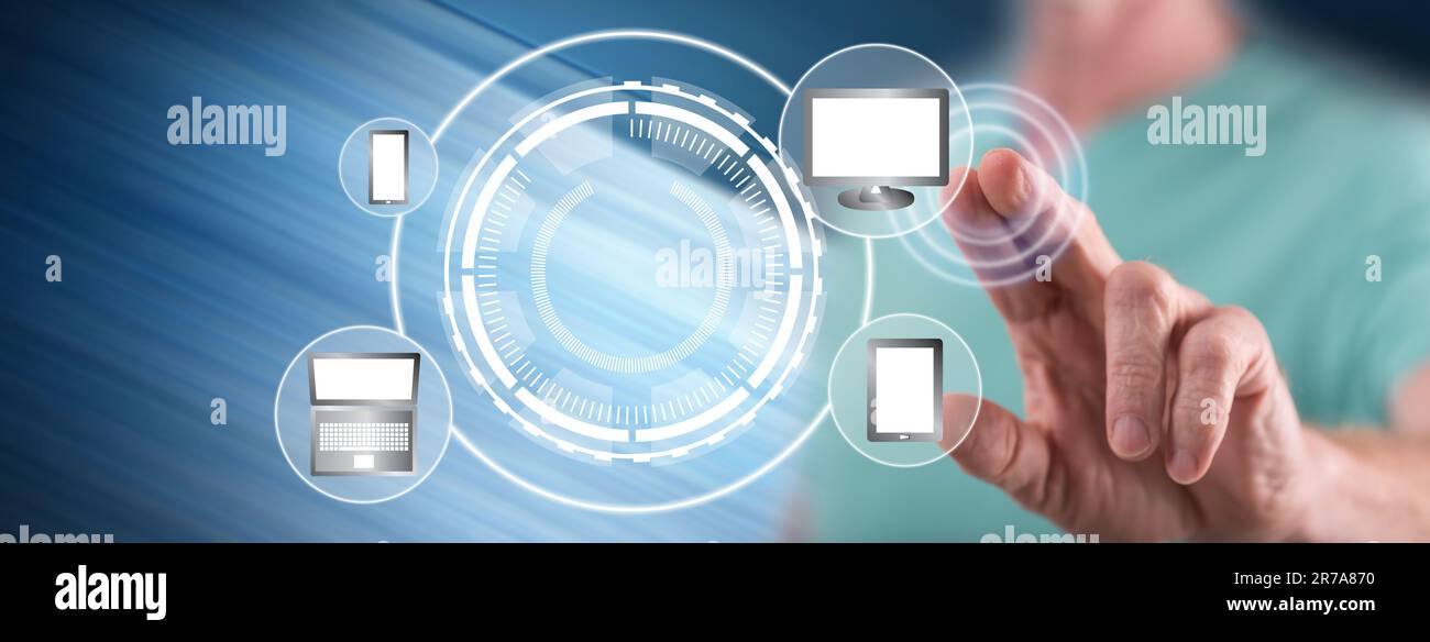 Man touching a device connection concept on a touch screen with his ...
