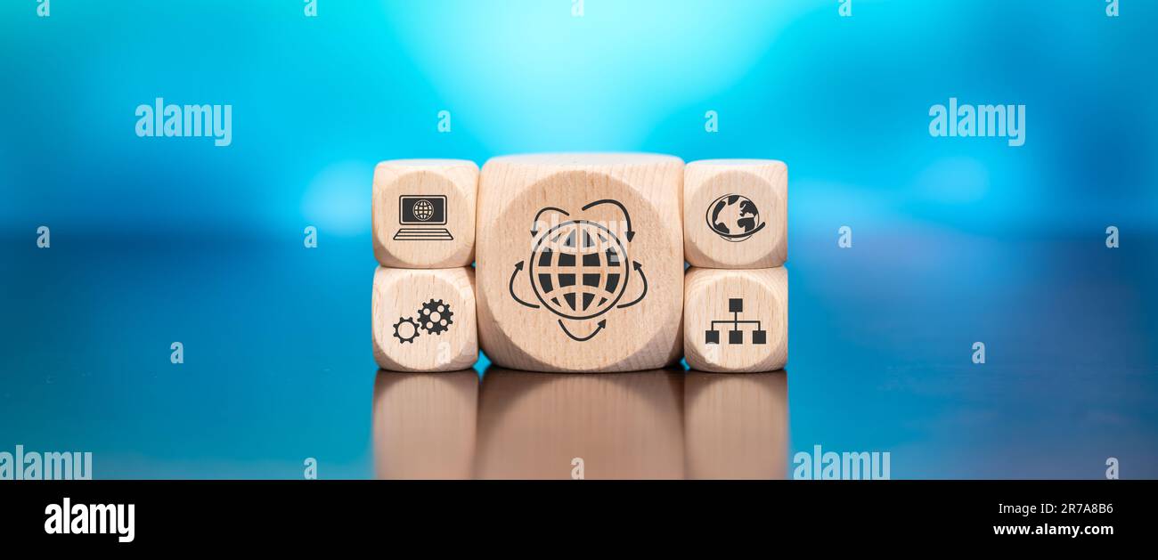 Wooden blocks with symbol of globalization concept on blue background ...