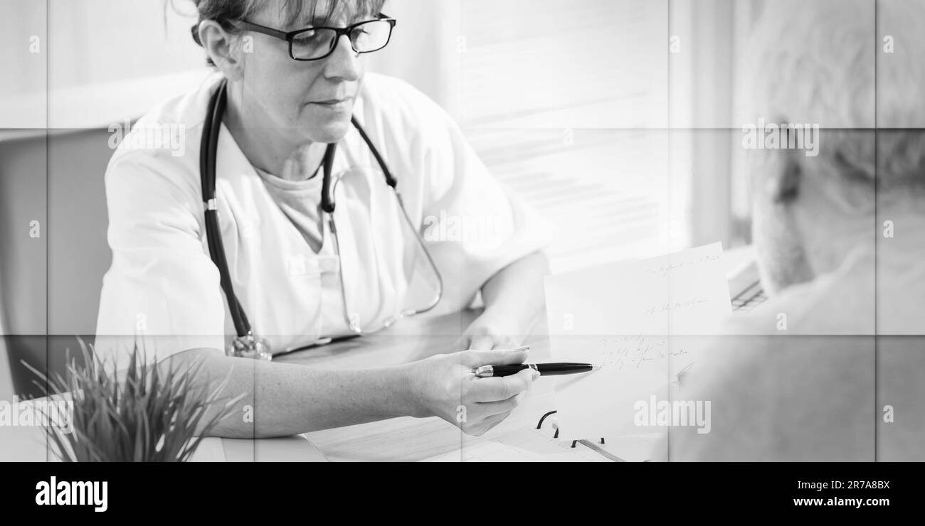 Doctor desk with patient Black and White Stock Photos & Images - Alamy